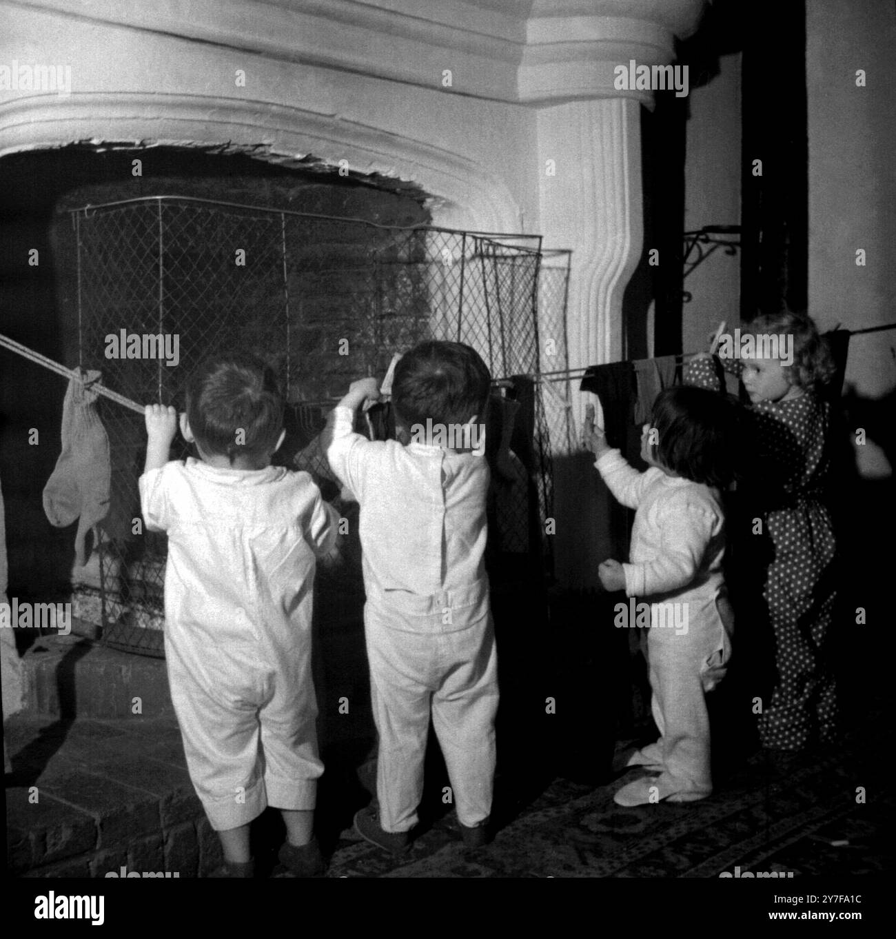 Children hanging up christmas stockings hi-res stock photography and ...