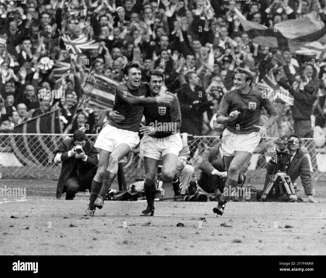 1966 World Cup Final England v West Germany Martin Peters is hugged by ...