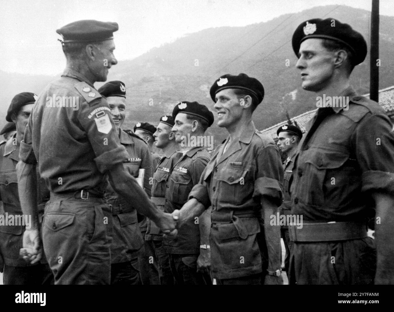 Its smiles all round at this happy reunion when returned prisoners of ...