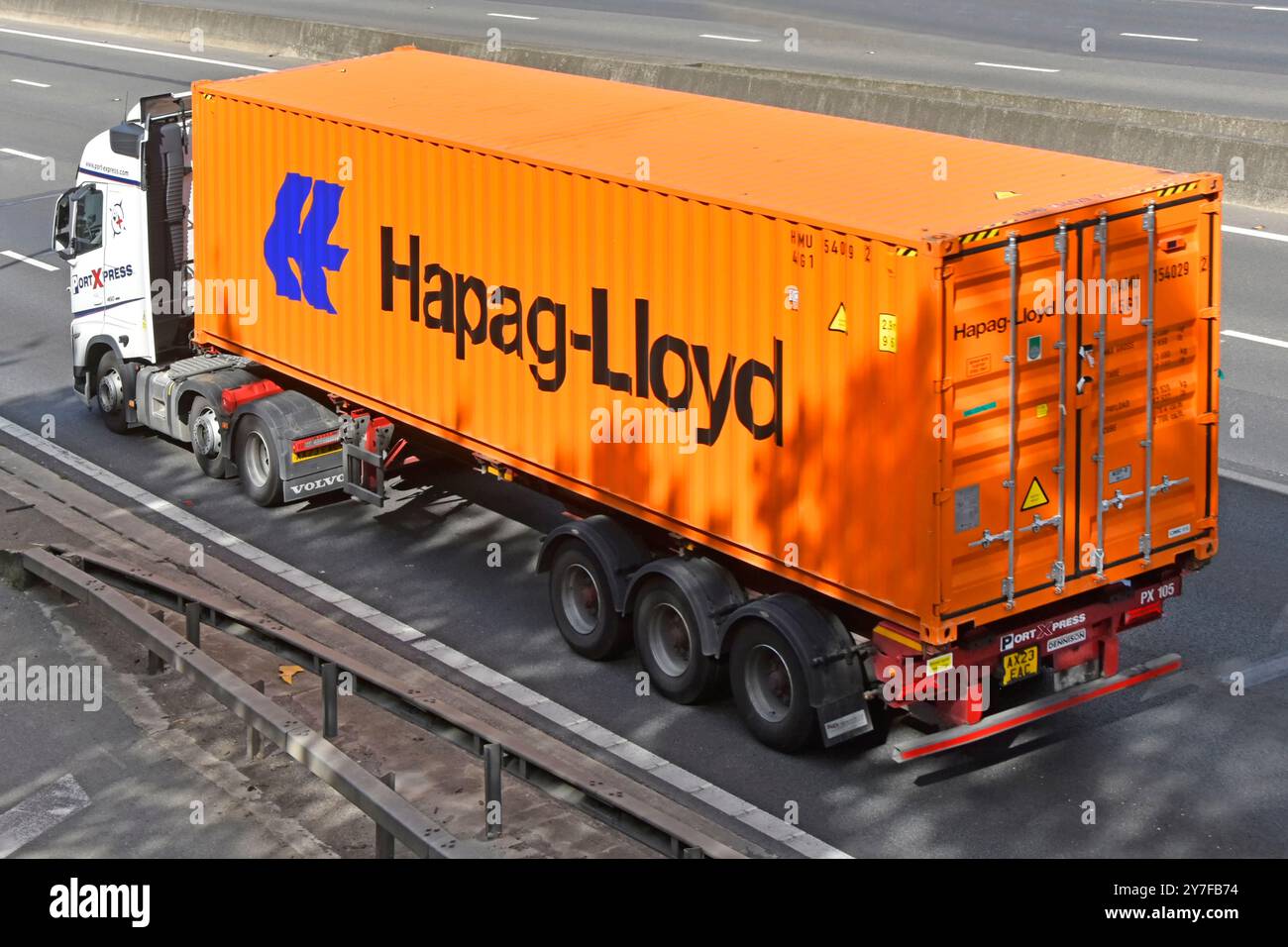 Hapag-Lloyd side back rear view intermodal shipping container on semi ...