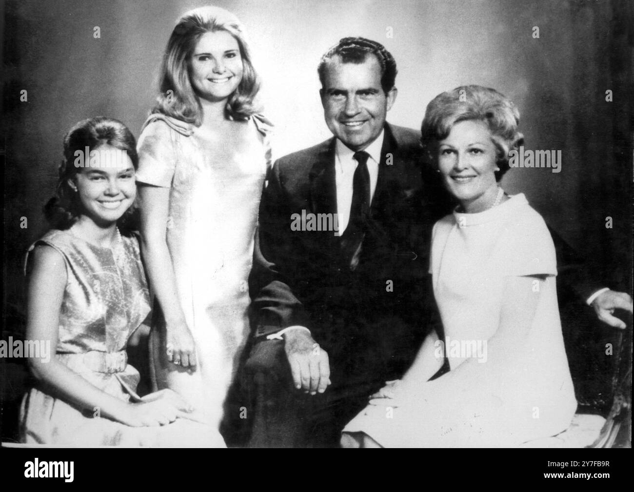 Richard Nixon with his family, his wife right, and their two daughters Julie 20, left, and ...