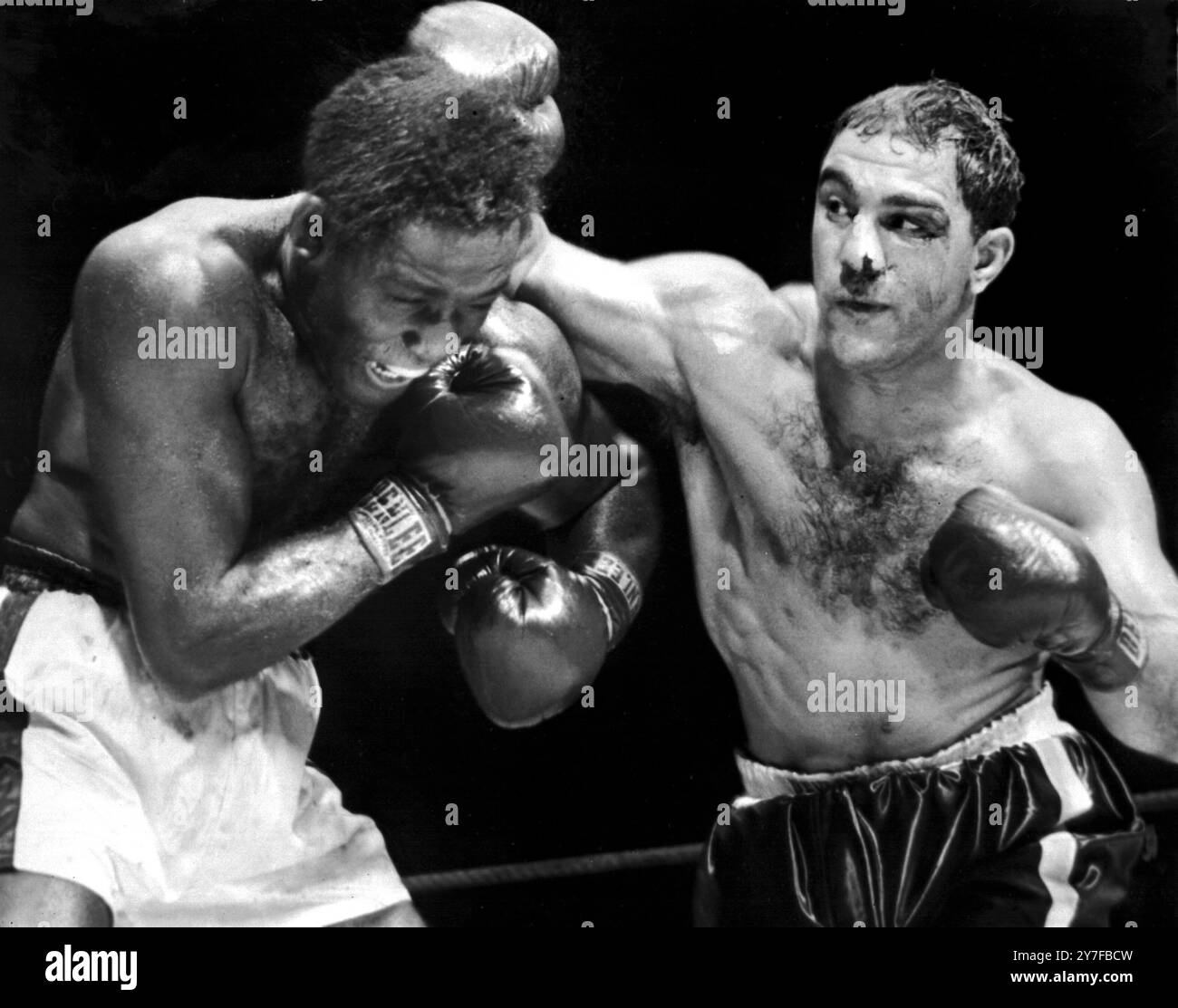 World Heavyweight Champion Rocky Marciano lands the punch that kept his ...