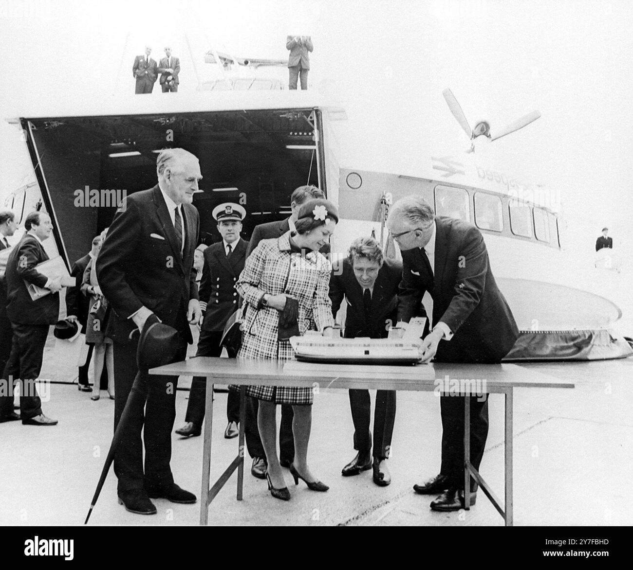 Princess Margaret and her husband Lord Snowdon being presented with a ...