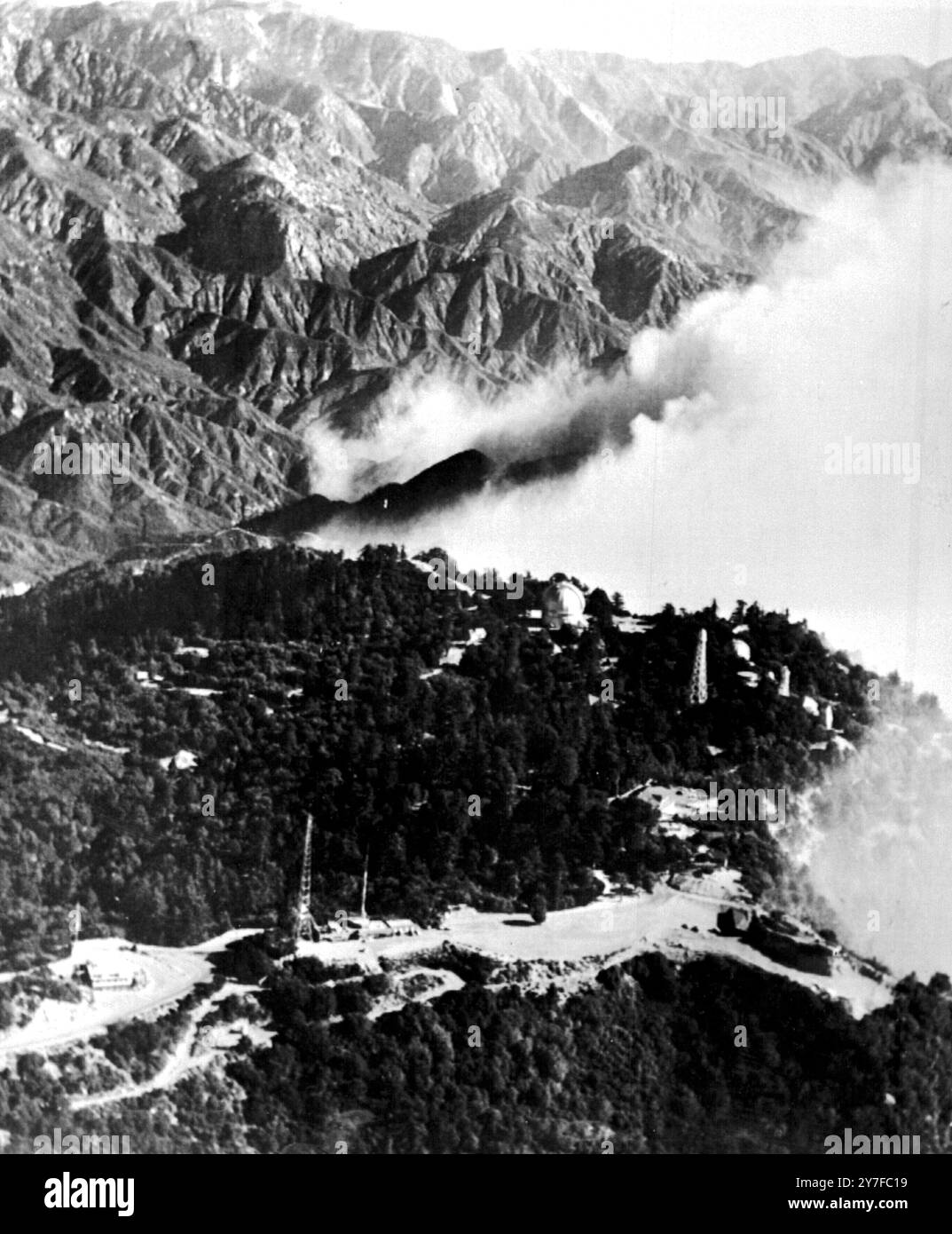 Aerial view of Mount Wilson Observatory as forest fires creep to a ...