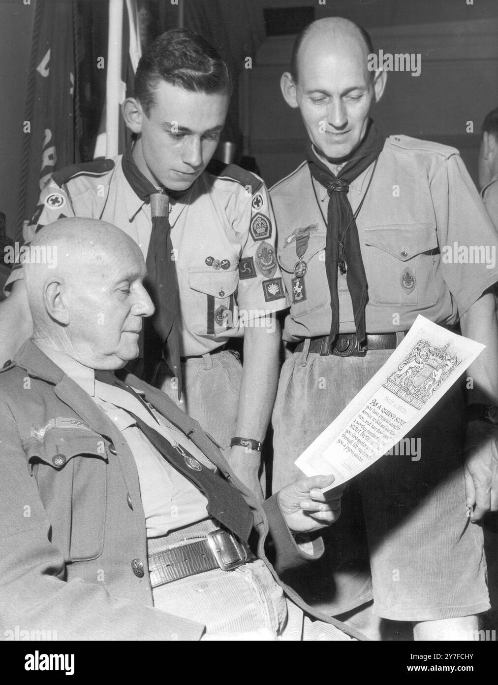 Grandfather , son and grandson - all are scouts .A grandfather, his son ...