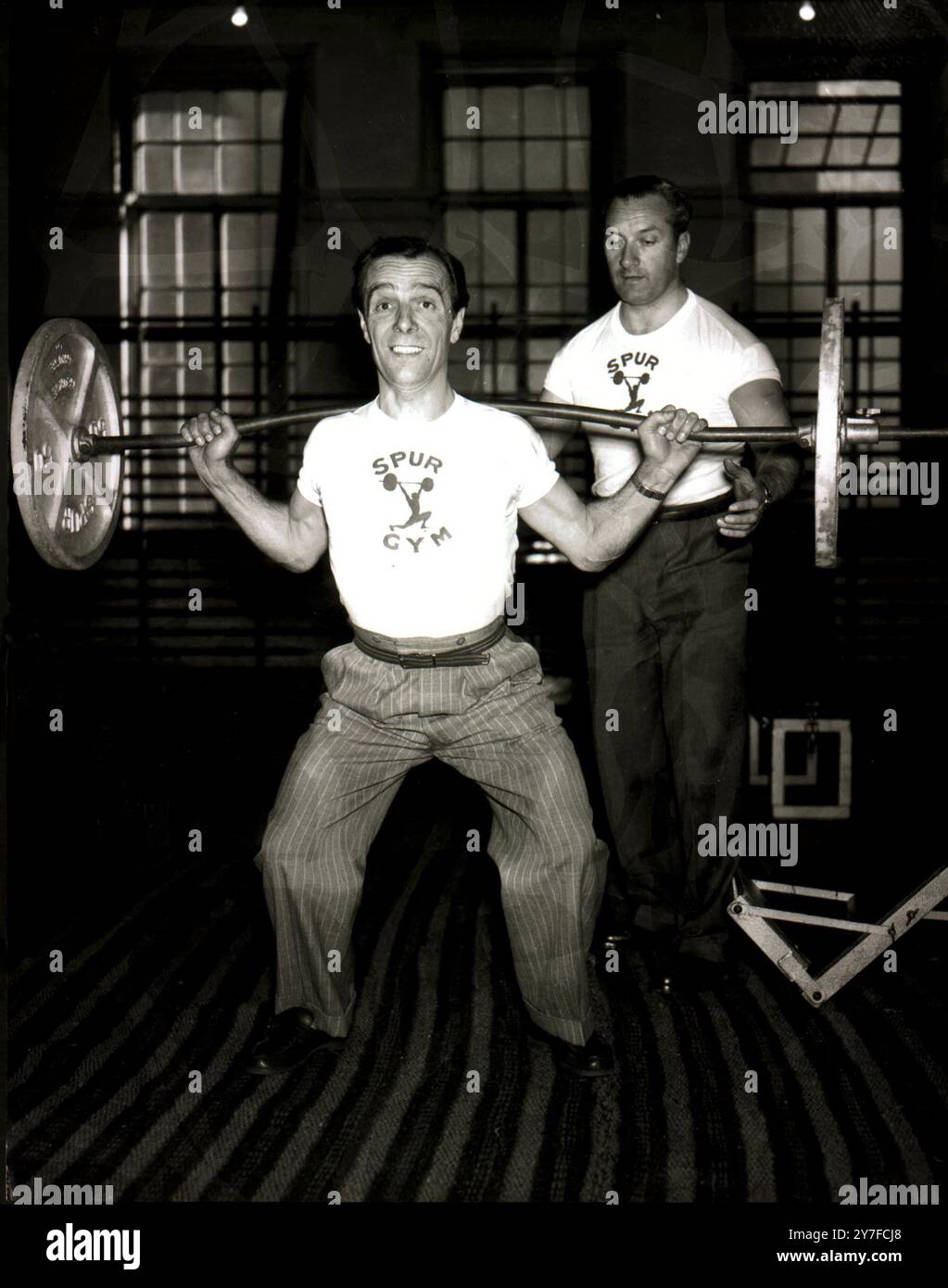 TV comedian Max Wall weightlifting 16th August 1954 Stock Photo - Alamy