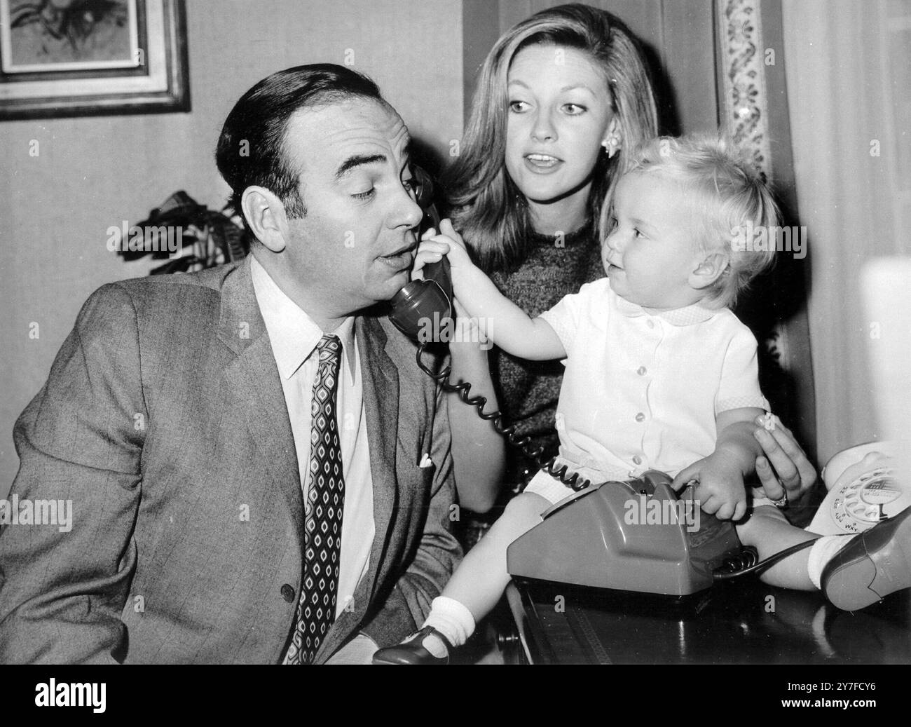 Newspaper magnate Rupert Murdoch and his wife Anna with their daughter ...
