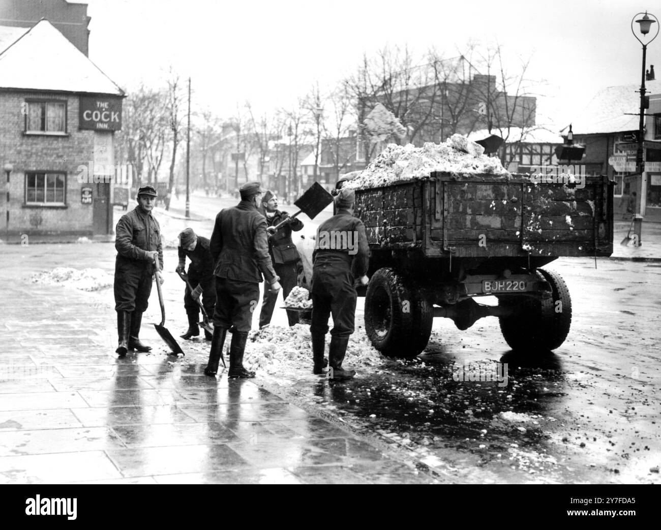 WW11 Britain.German POW's clear snow from the roads in southern England ...