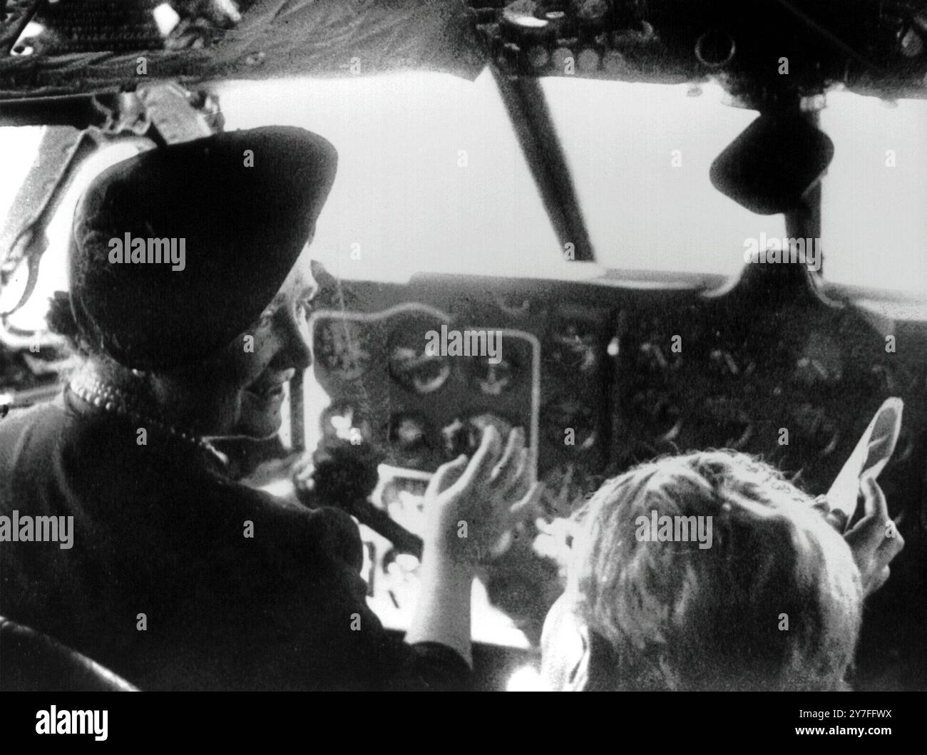 Her Majesty, Queen Elizabeth, The Queen Mother in the pilot's seat of a ...