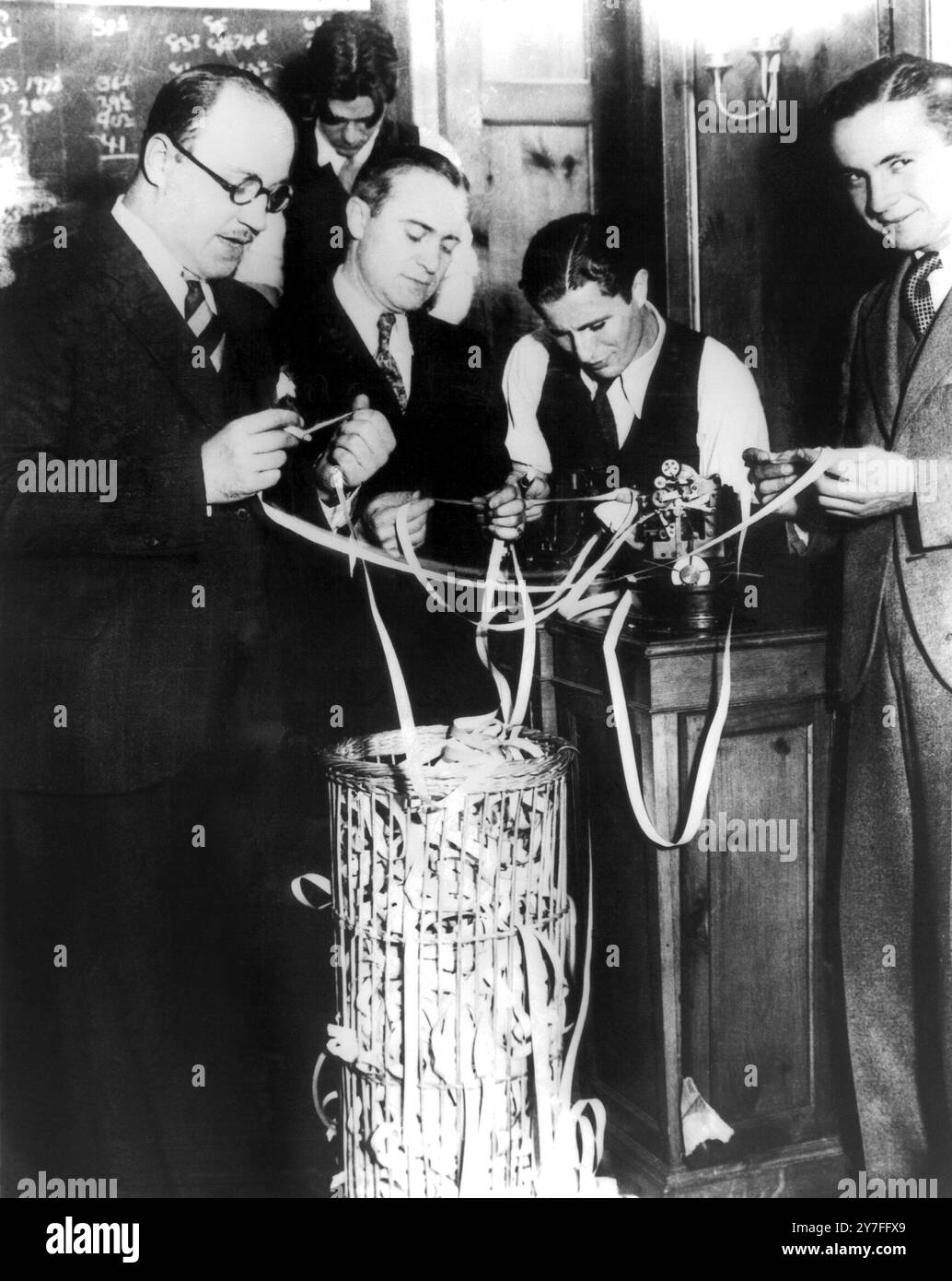 The stock market crash in 1929. Money traders watch the ticker tape ...