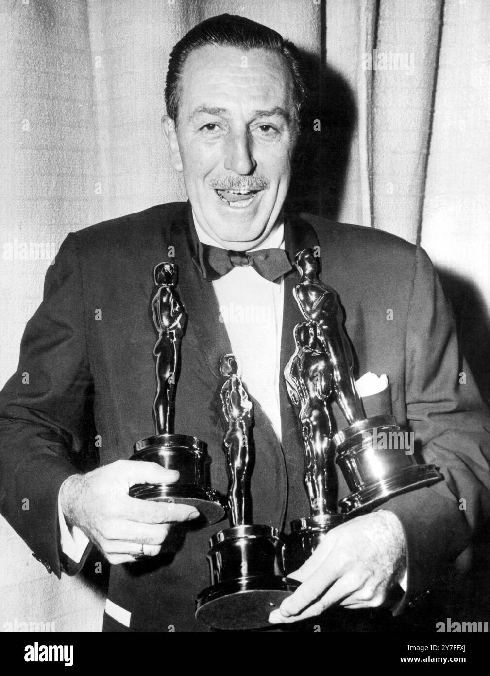 Walt Disney holding the Oscars he won in 1962 Stock Photo - Alamy