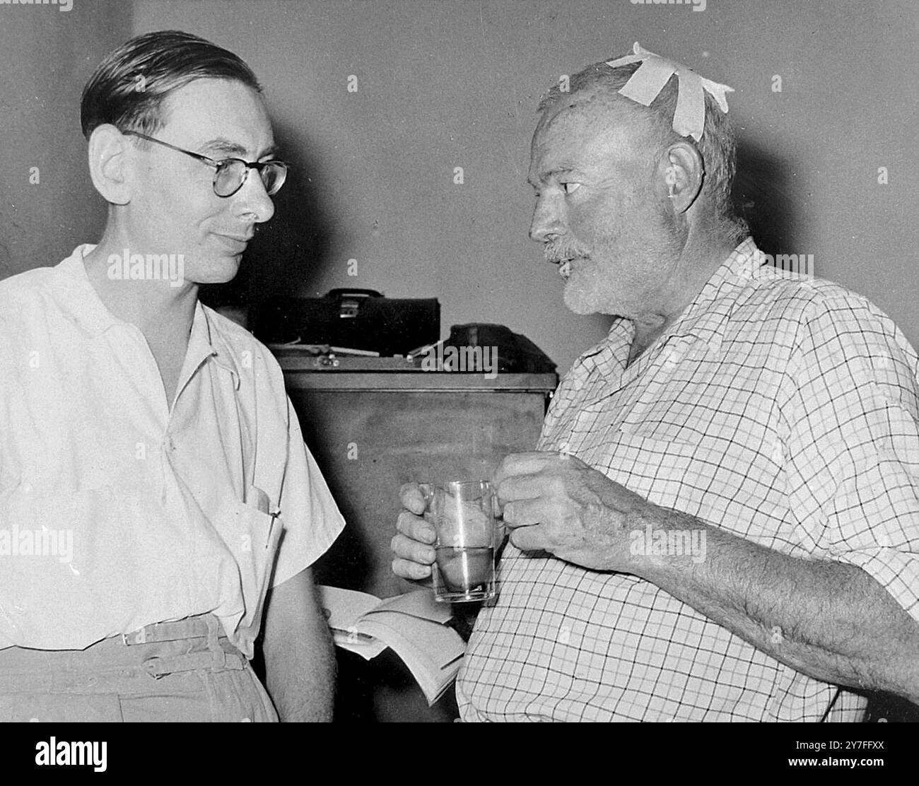 Ernest Hemingway with head injuries after his double plane crash in ...