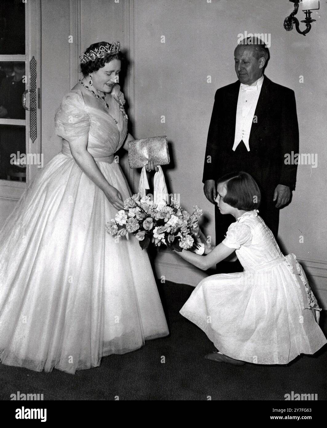 Penelope Johnson 12 year old curtseying to the Queen Mother as she ...