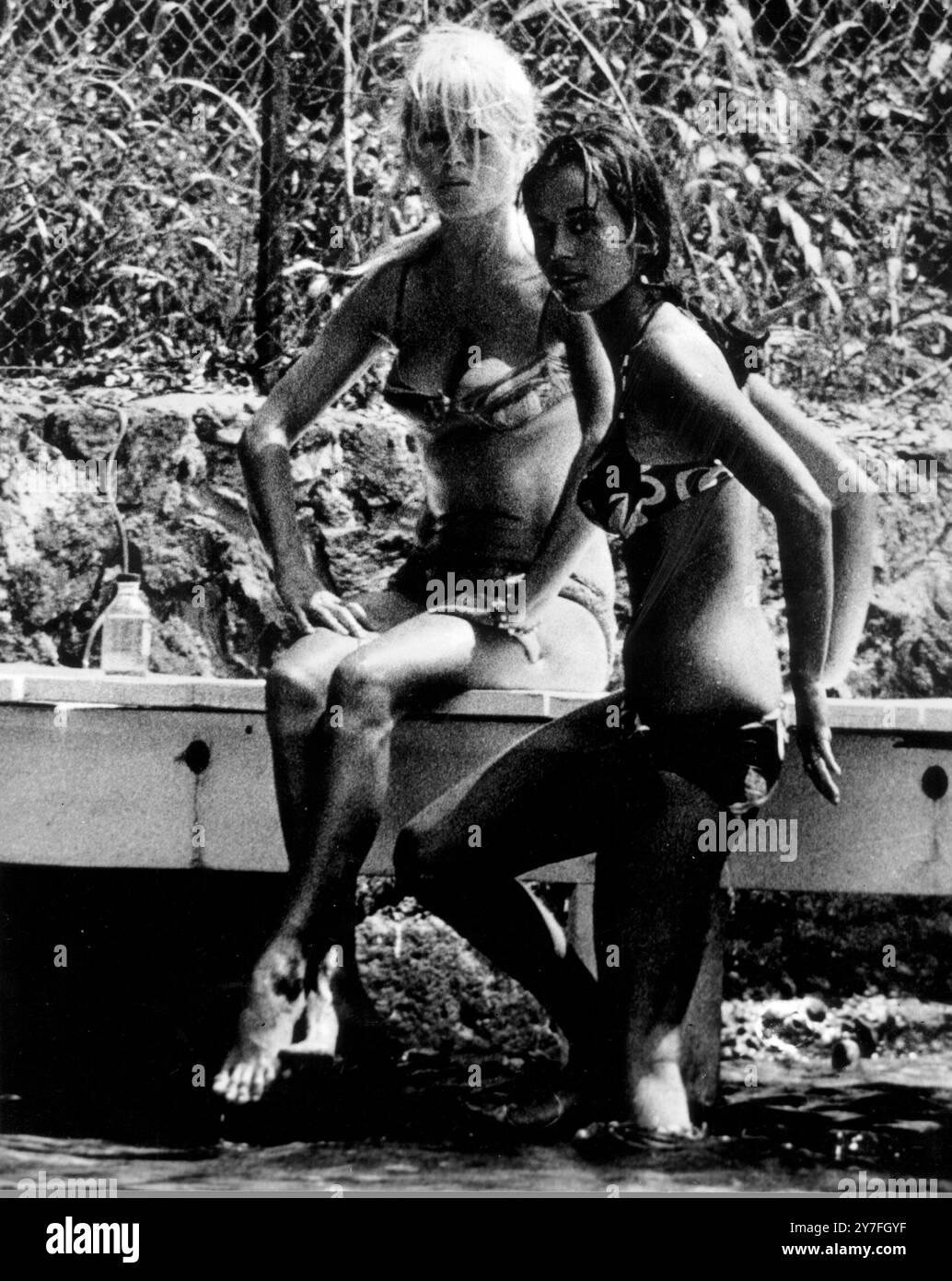 Brigitte Bardot with a friend in the secluded surroundings of her St Tropez villa 20th July 1965 ...