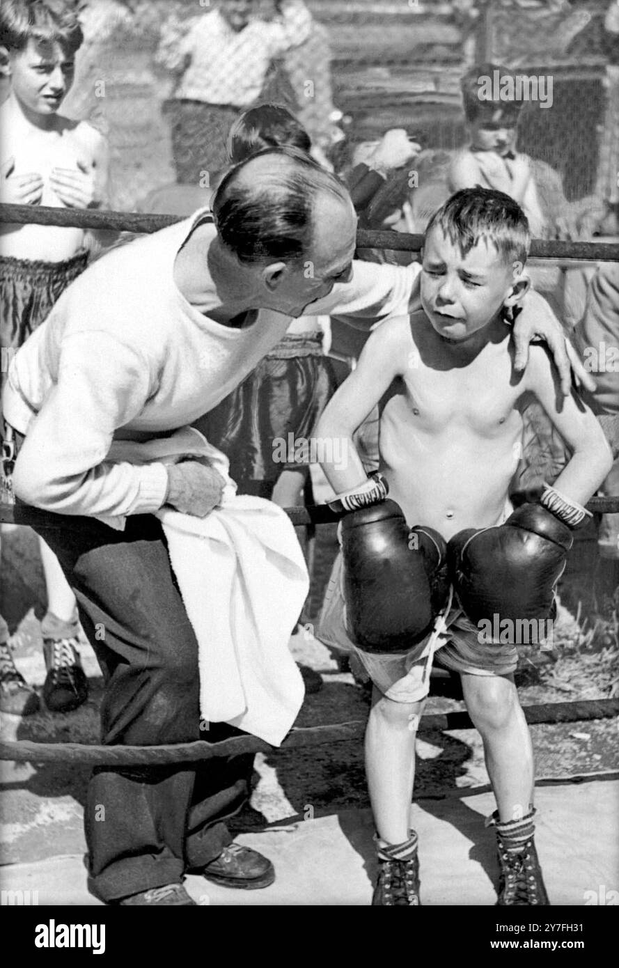 "Boy crying in the boxing ring Stock Photo - Alamy