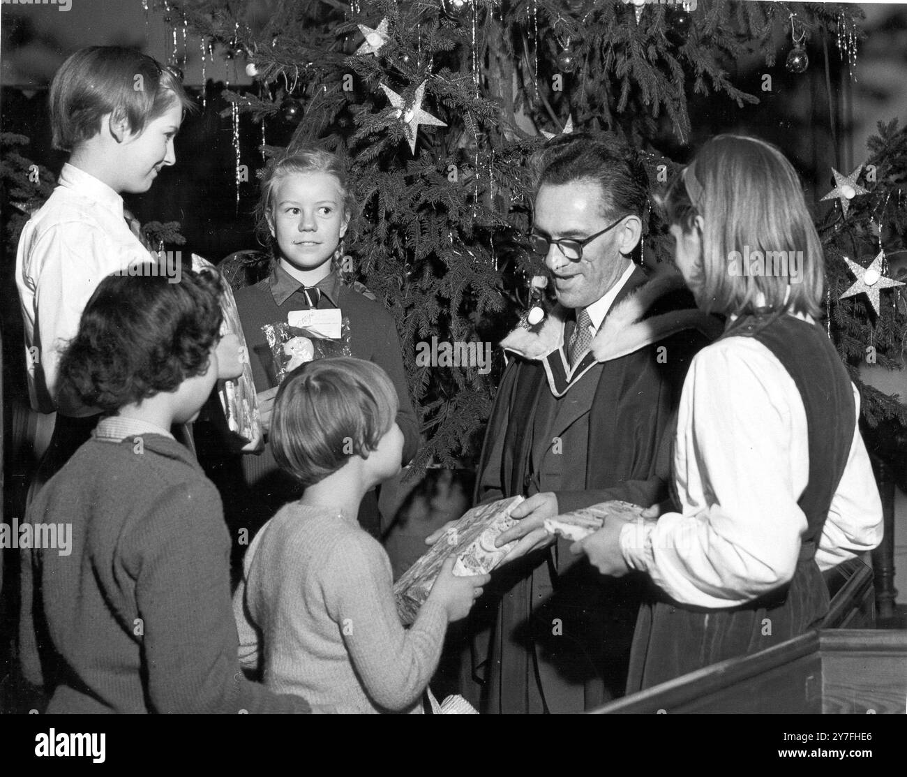 Christmas tree presents in Black and White Stock Photos & Images - Alamy