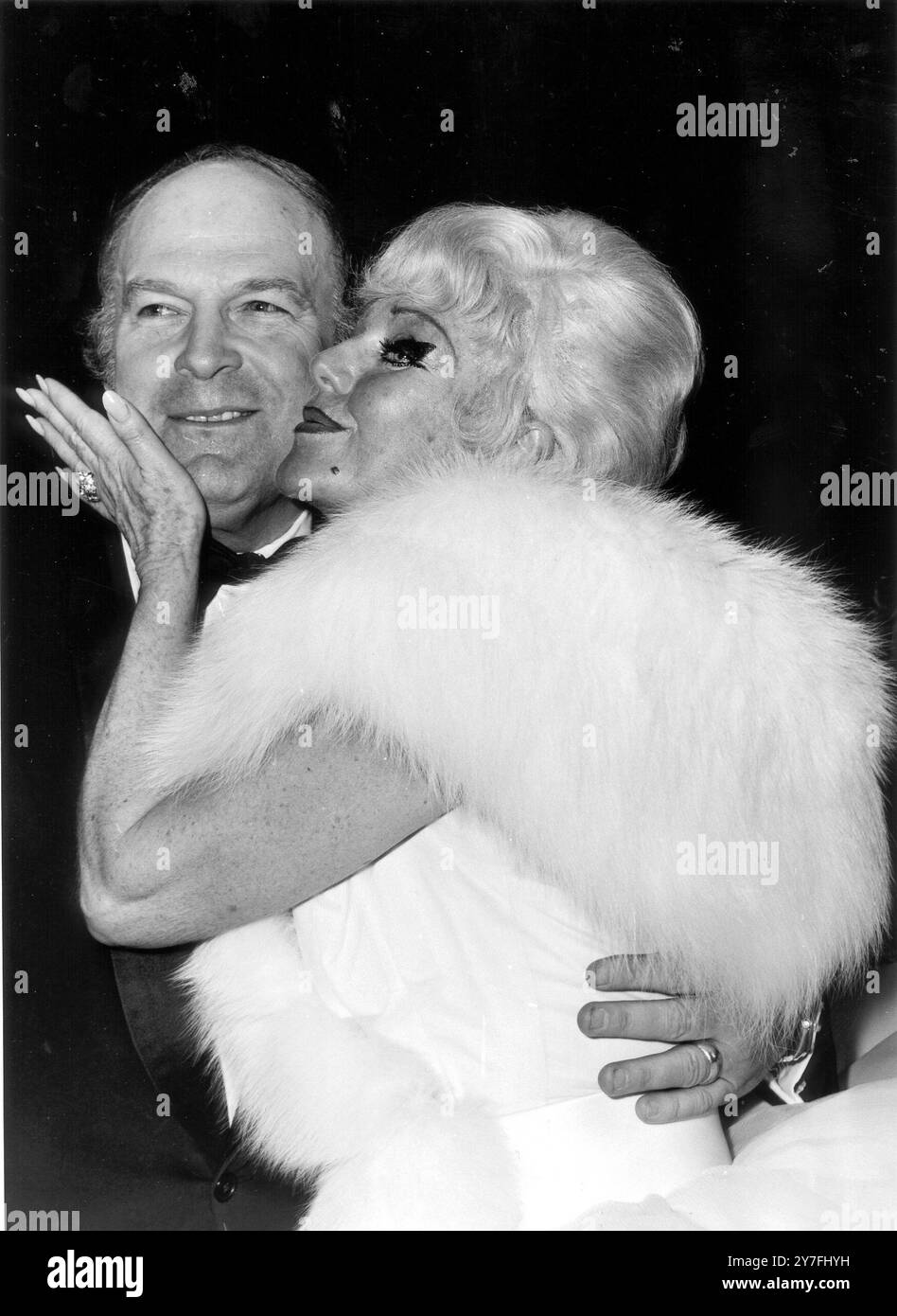 Ginger Rogers greets her husband Bill Marshall at Drury Lane Theatre ...