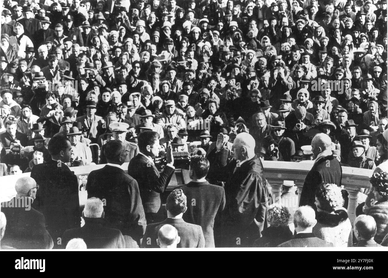 Crowd watching John F. Kennedy being sworn in as President of the USA ...