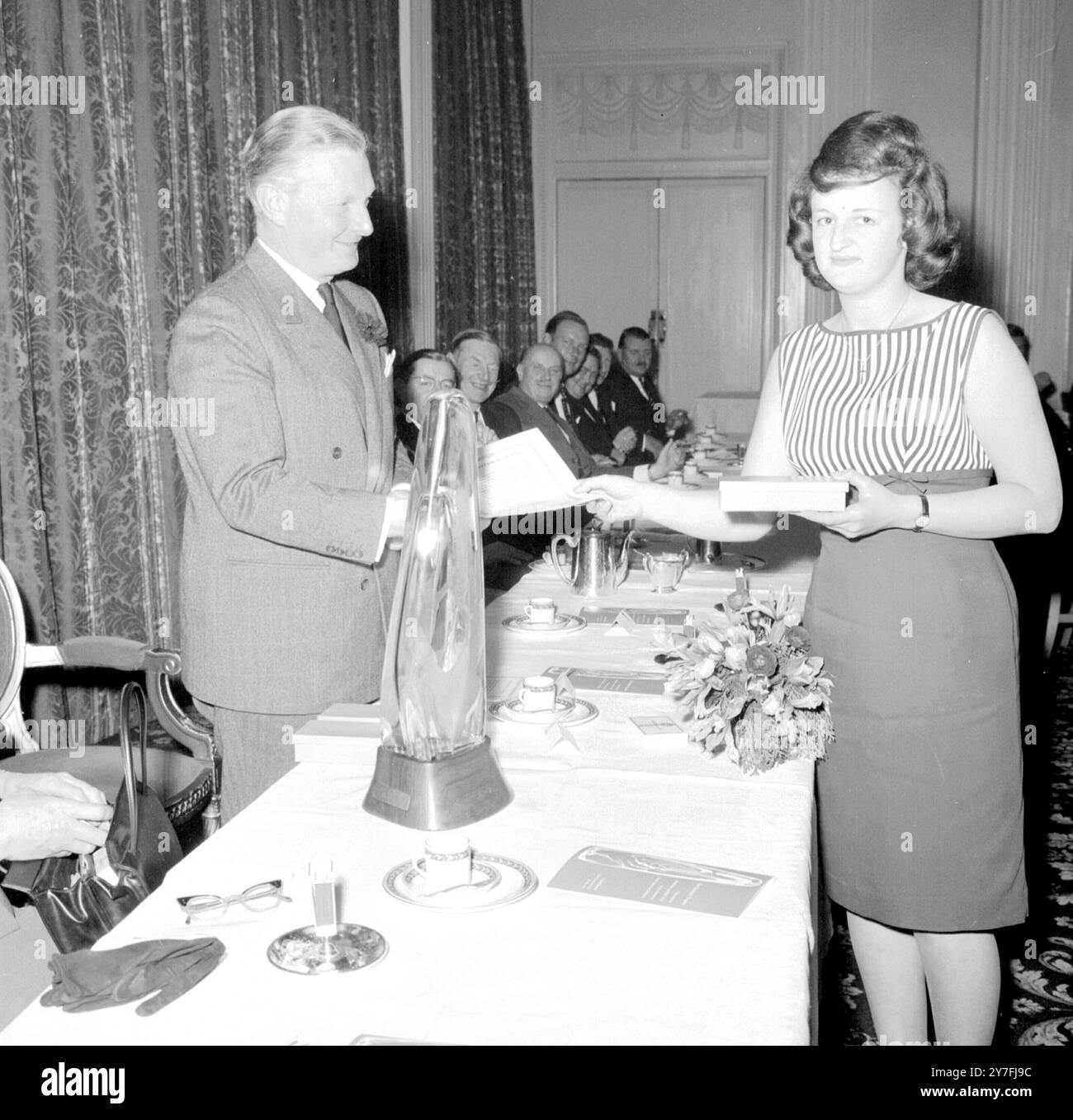 Mr John Davies (L) Vice Chairman of Shell-Mex and BP Ltd presents a ...