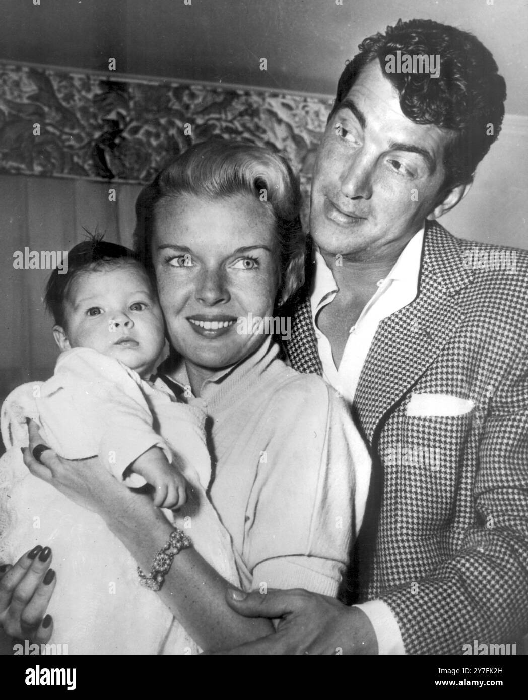 Dean Martin with his wife Jeanne who is holding their son Ricci ...