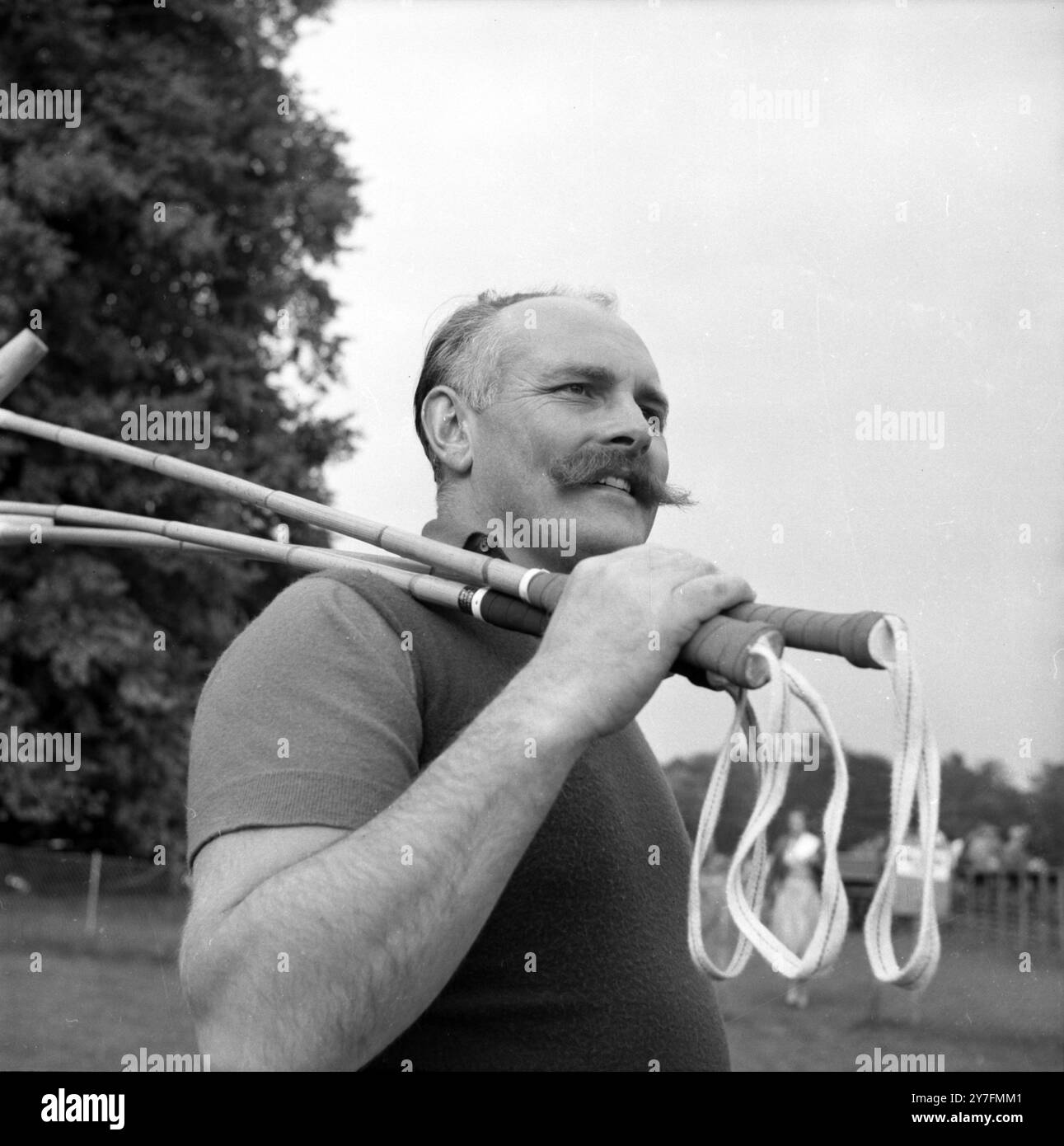 Jimmy Edwards, actor and comedian between chukkas during a polo match ...