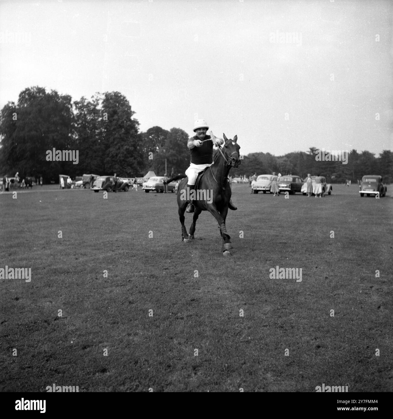 Jimmy Edwards, actor and comedian during a polo match. He was a keen ...