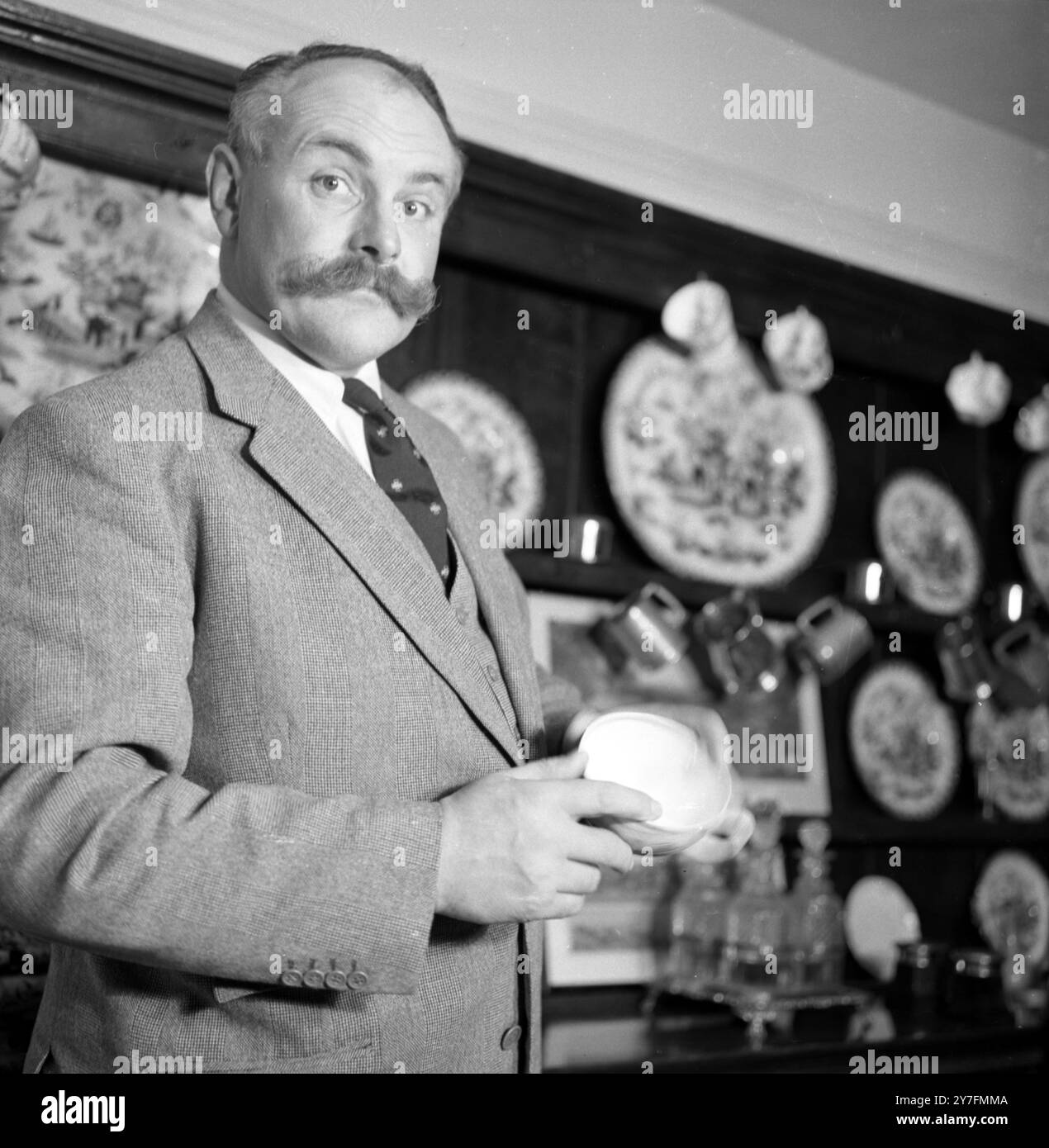 Jimmy Edwards, actor and comedian, at home Stock Photo - Alamy