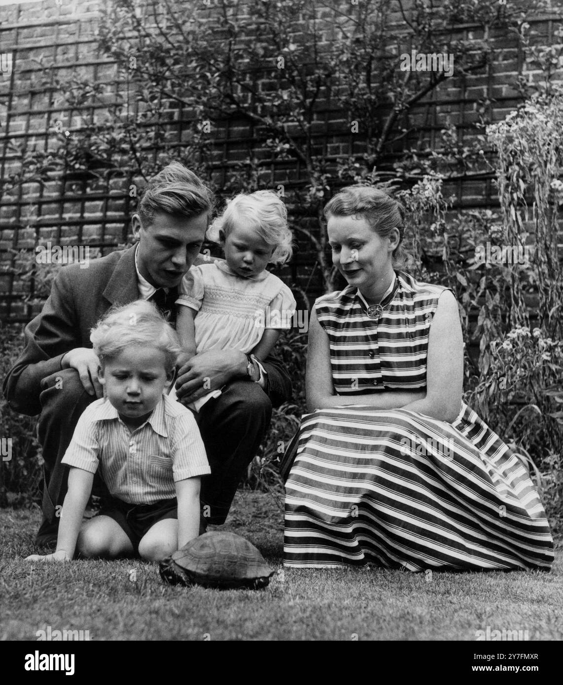 David Attenborough 1950's .Taken at his British home in the garden with ...
