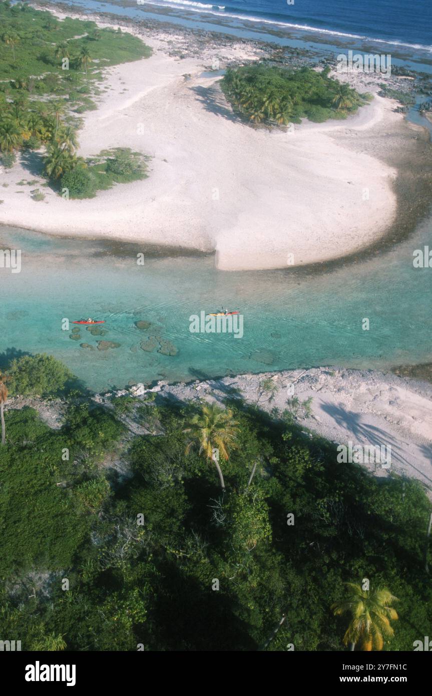 An aerial view of the buildings and thin strips of coral land that ...