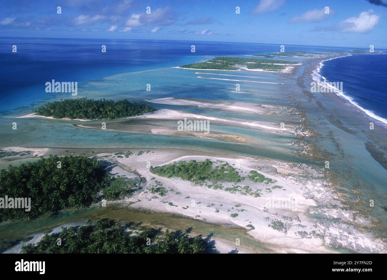 An aerial view of the buildings and thin strips of coral land that ...