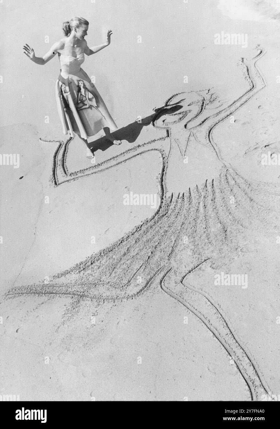 Girl dancing with a sand drawing by cartoonist Warren Kremer on Santa ...
