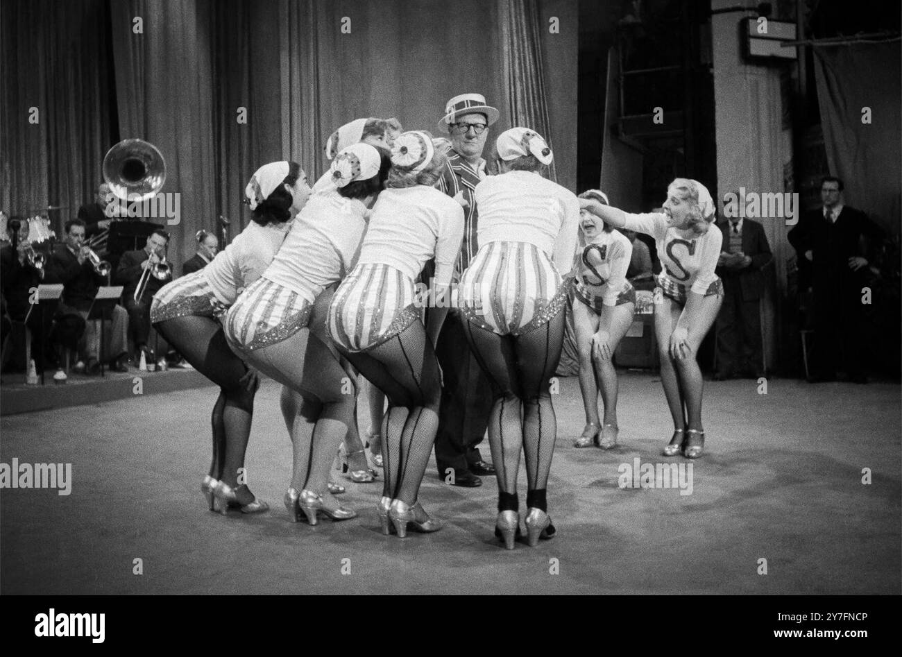 Bandleader Billy Cotton and his 12-girl team of glamorous dancers, The ...