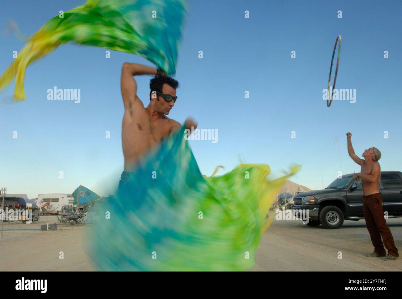 A dancing man at Burning Man Festival in the Red Rock Desert of Nevada ...