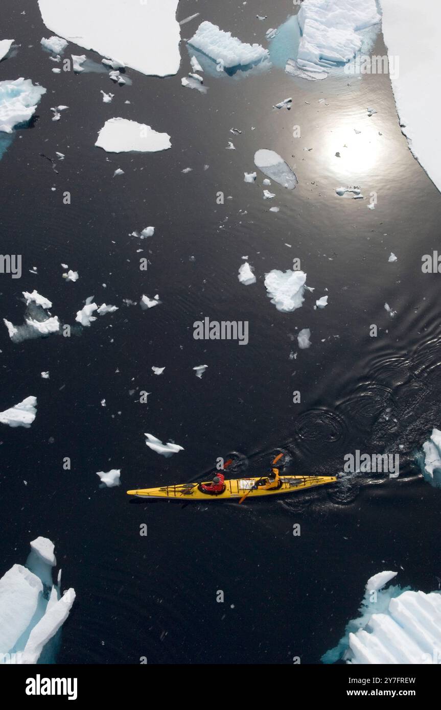 Two kayakers maneuver their way through the pack ice around the Fish ...