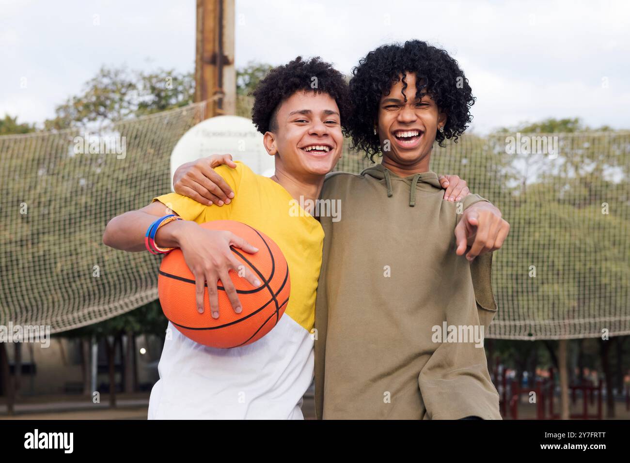 teen friends laughing happy with basket ball Stock Photo - Alamy
