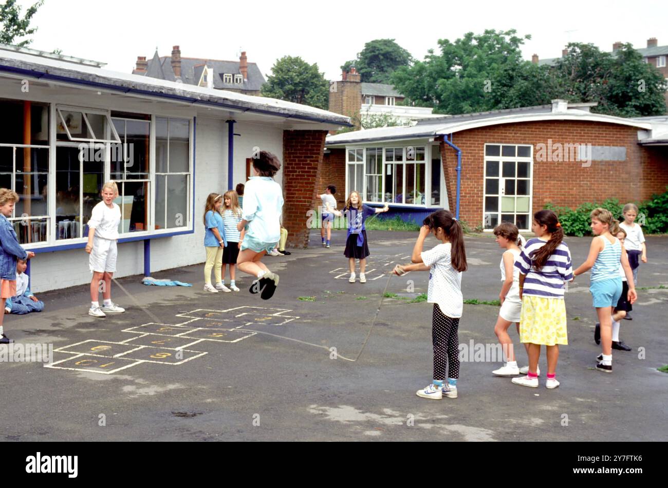 Primary school, games in the playground Stock Photo - Alamy