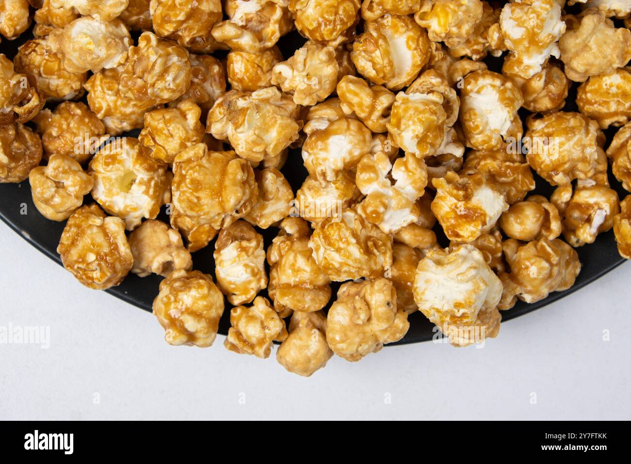 Sweet caramelized popcorn top view close up Stock Photo - Alamy