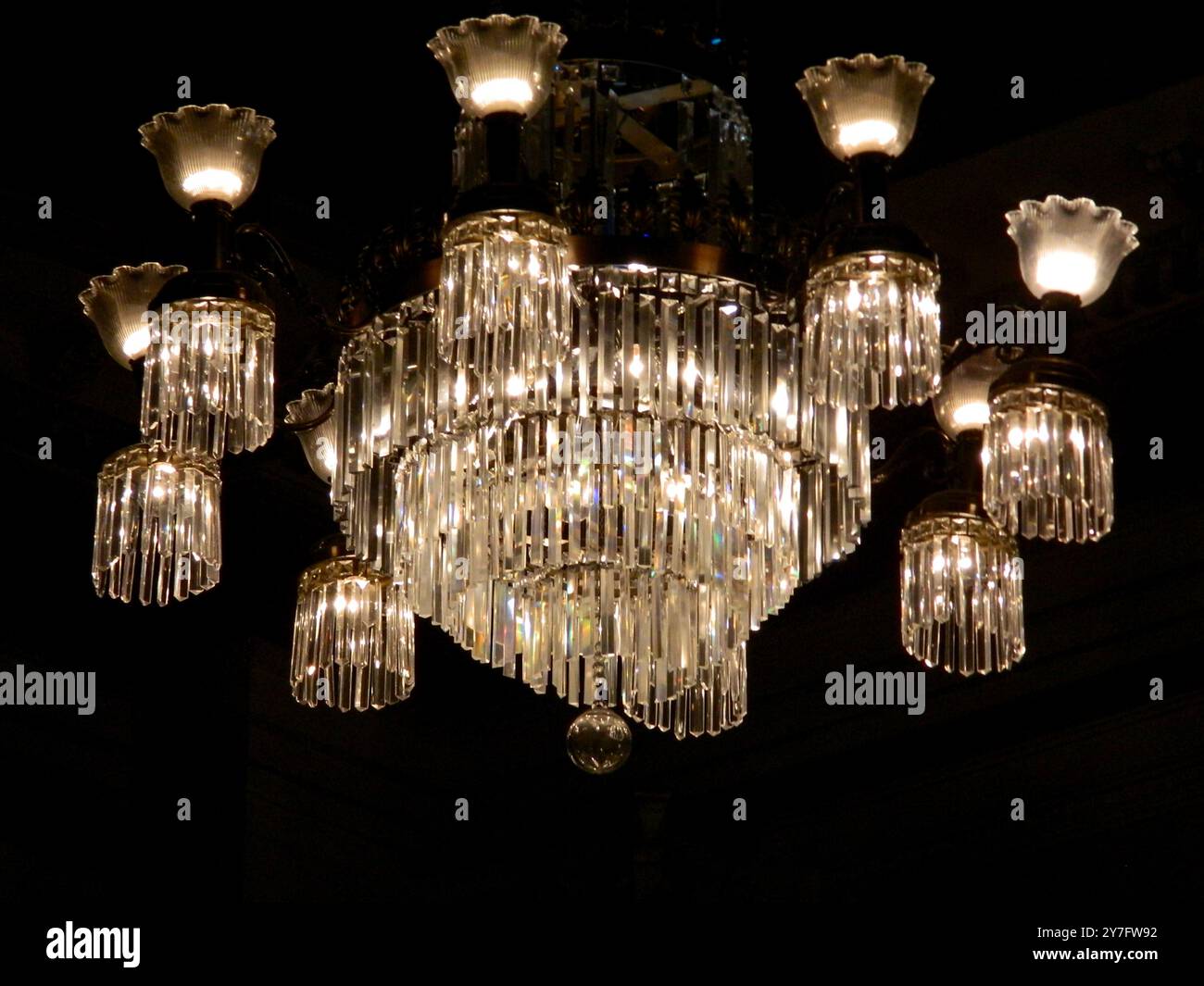 Dramatic Antique Crystal Chandelier with prisms and a solid background ...