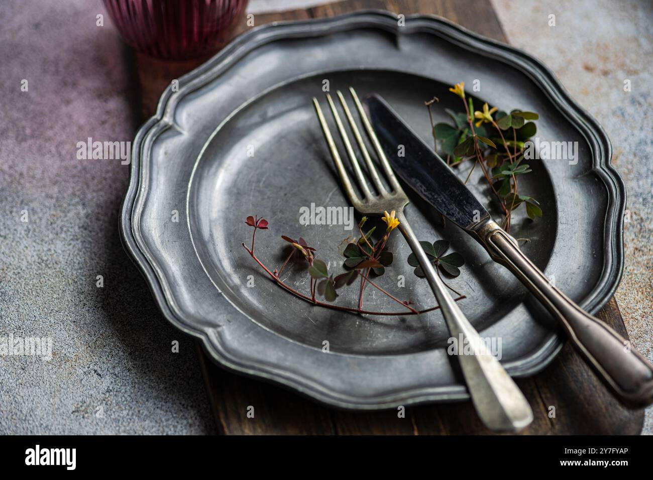 Table setting with fresh shamrock leaves Stock Photo - Alamy