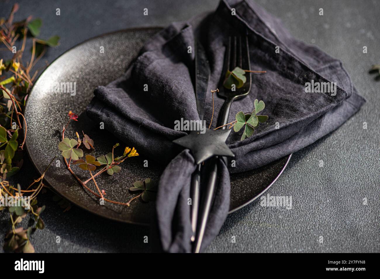 Table setting with fresh shamrock leaves Stock Photo - Alamy