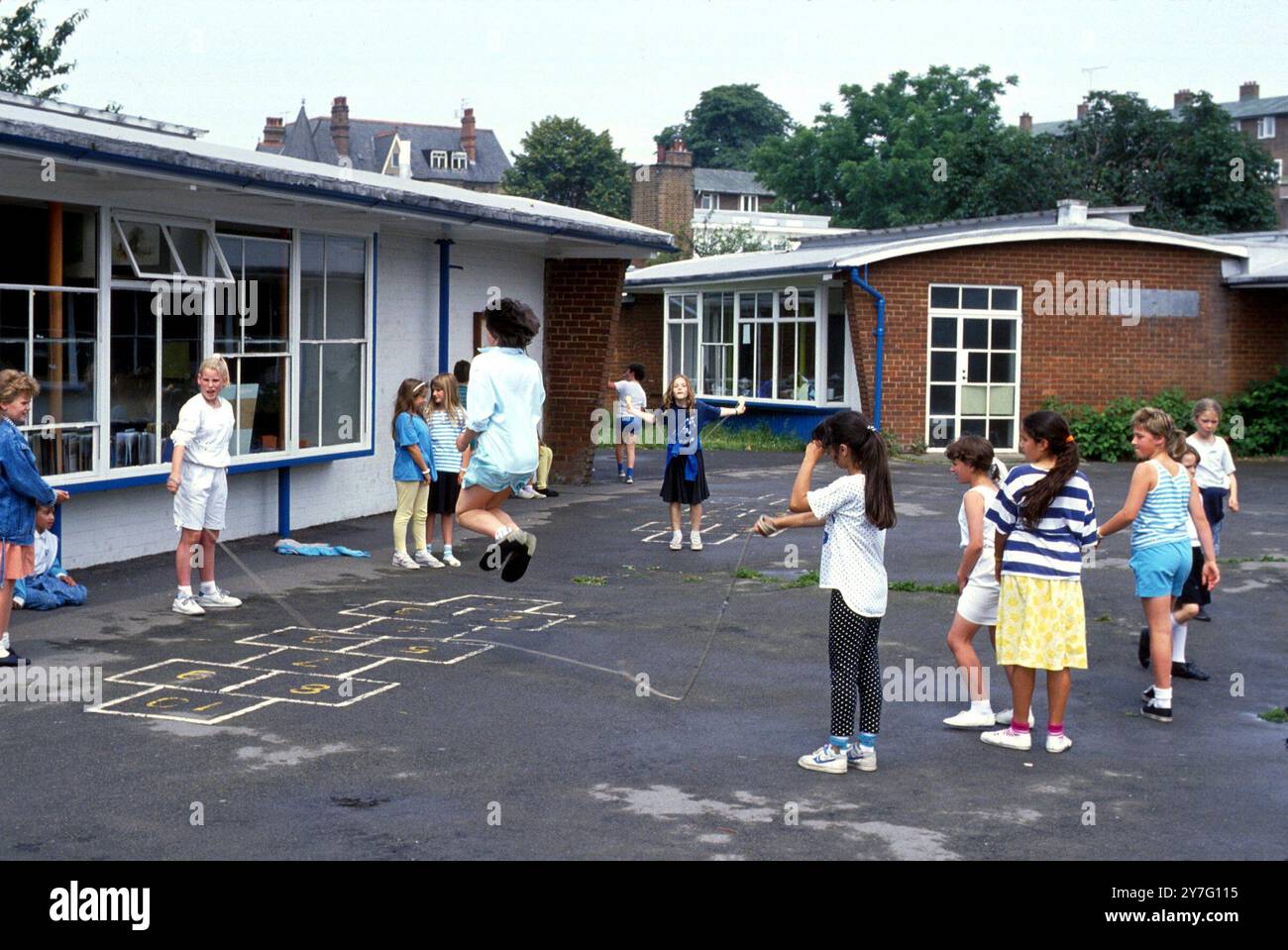Primary school, games in the playground Stock Photo - Alamy