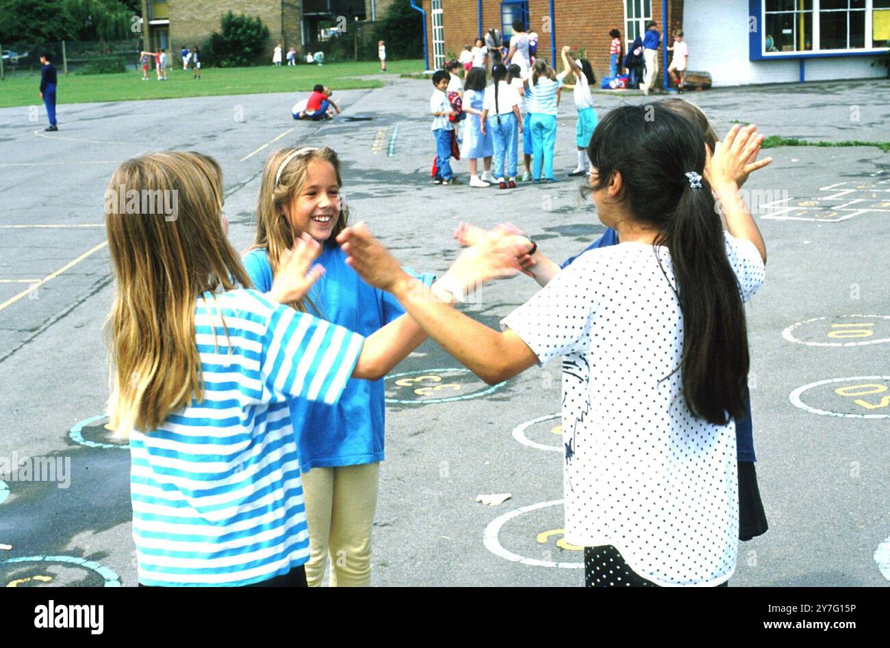 Primary School girls play improvised games Stock Photo - Alamy