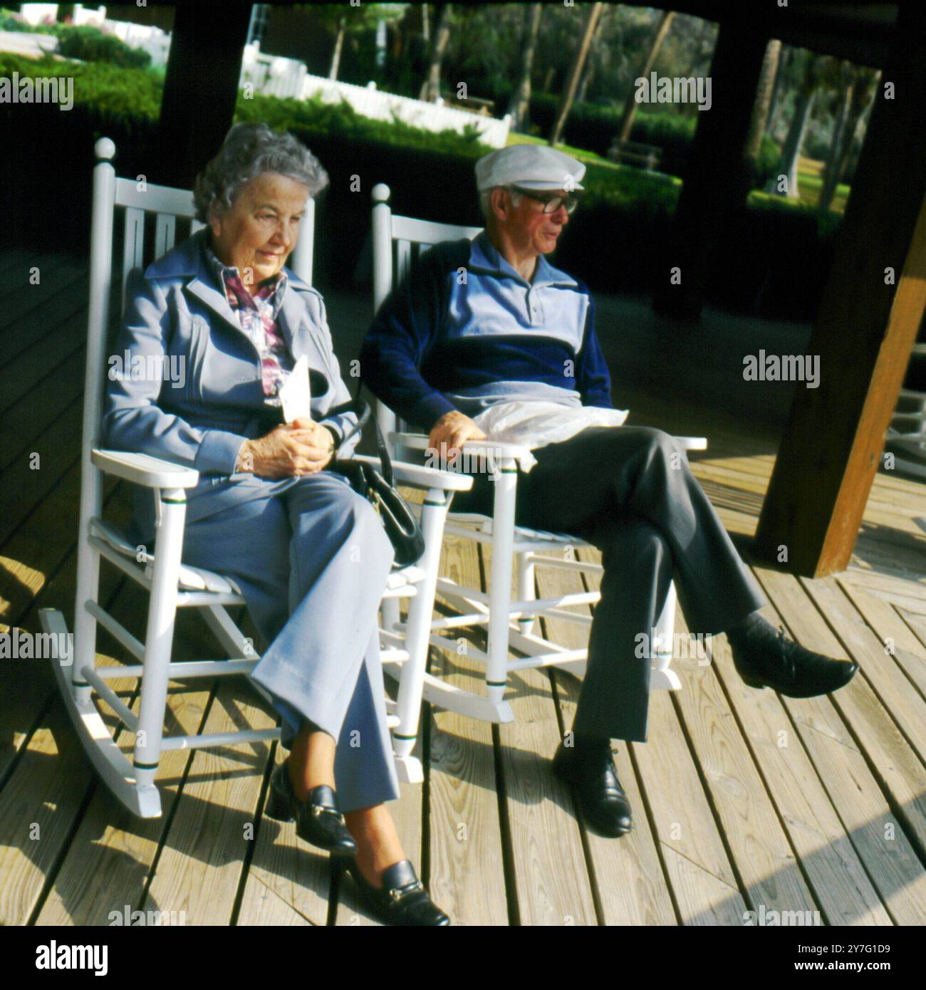 An elderly couple sitting in rocking chairs at Regent's Park Old People ...