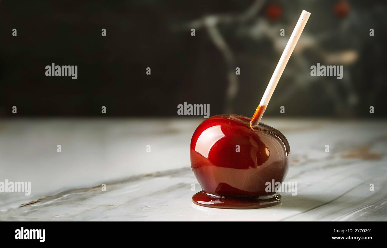 Halloween-themed red toffee apple with shiny caramel glaze and a small ...