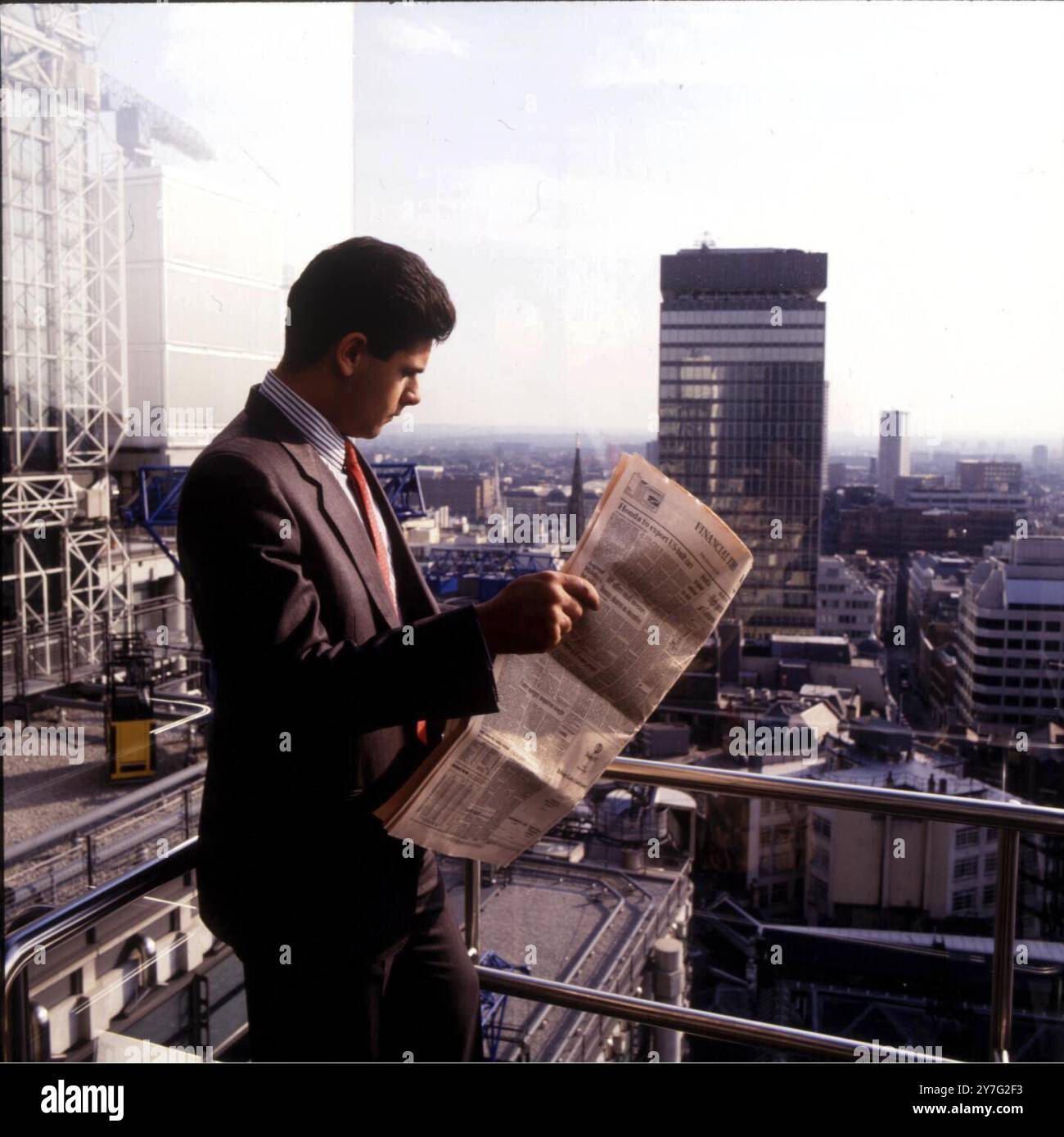 Stock Market Investor reading a newspaper Stock Photo - Alamy