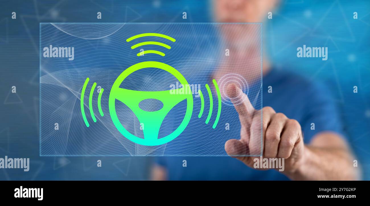 Man touching a self-driving car concept on a touch screen with his ...