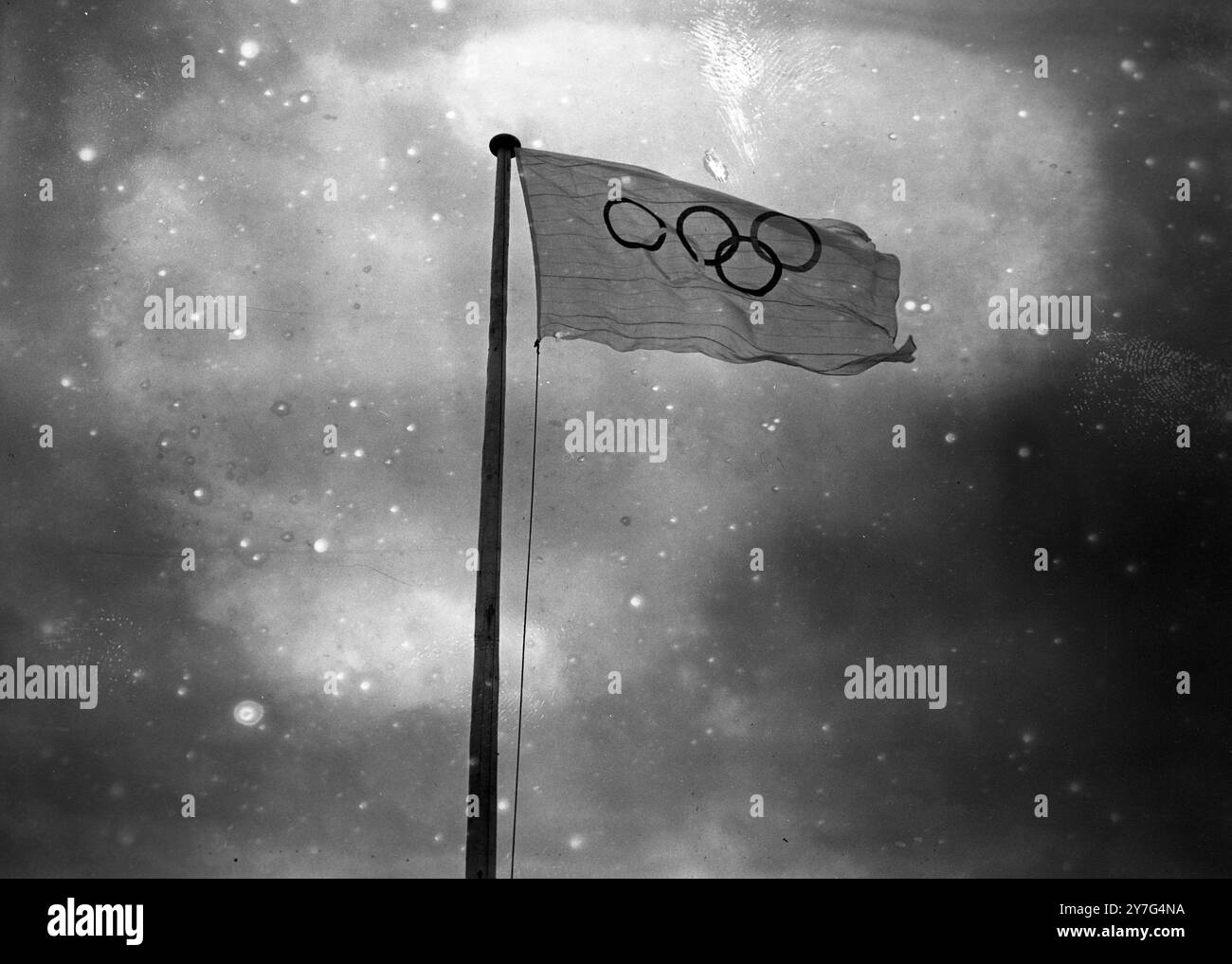 The Olympic Flag Goes Up Lord Burghley Chairman of the Organising ...