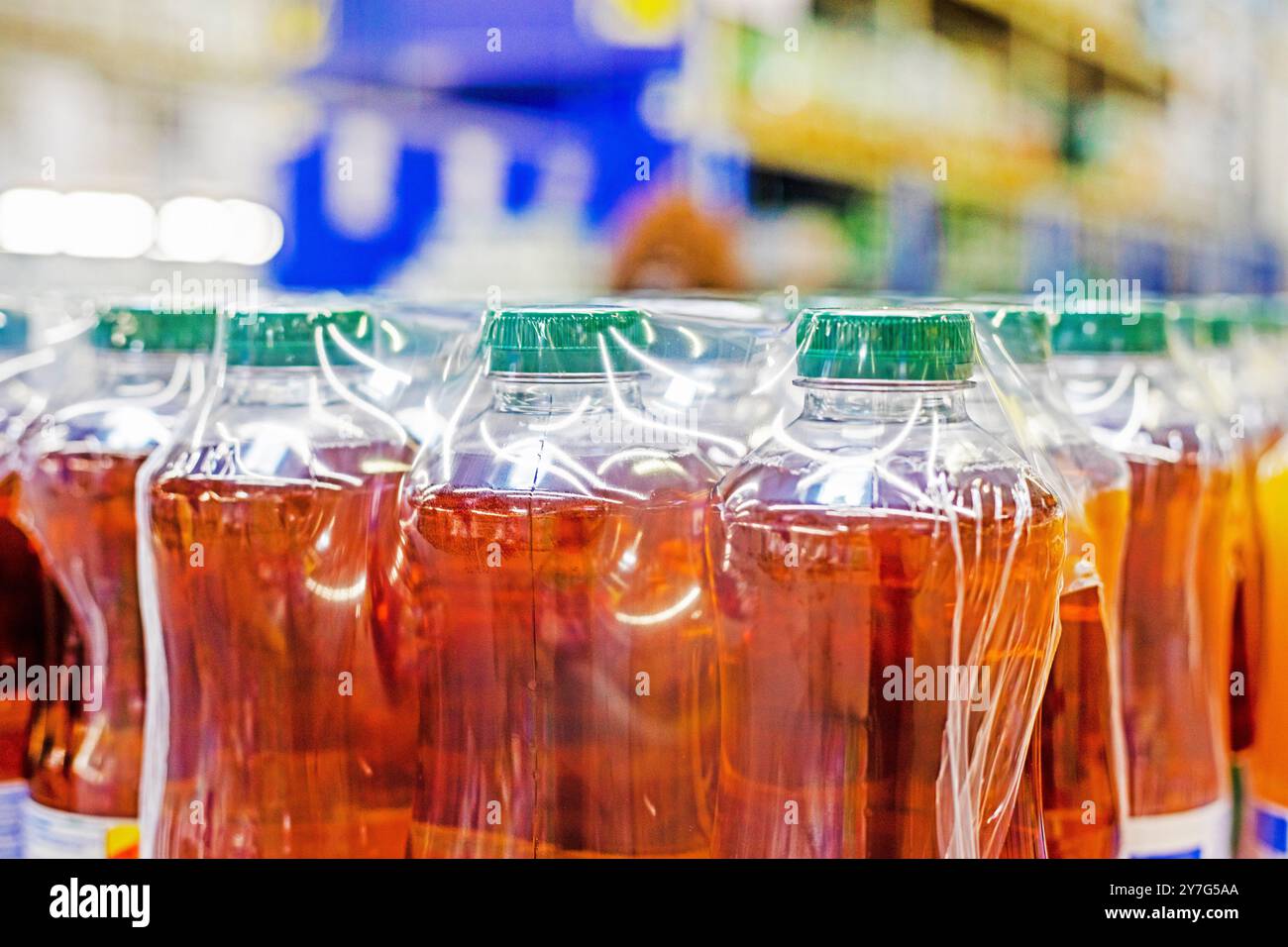 natural juice packed in plastic containers in the supermarket. Healthy ...
