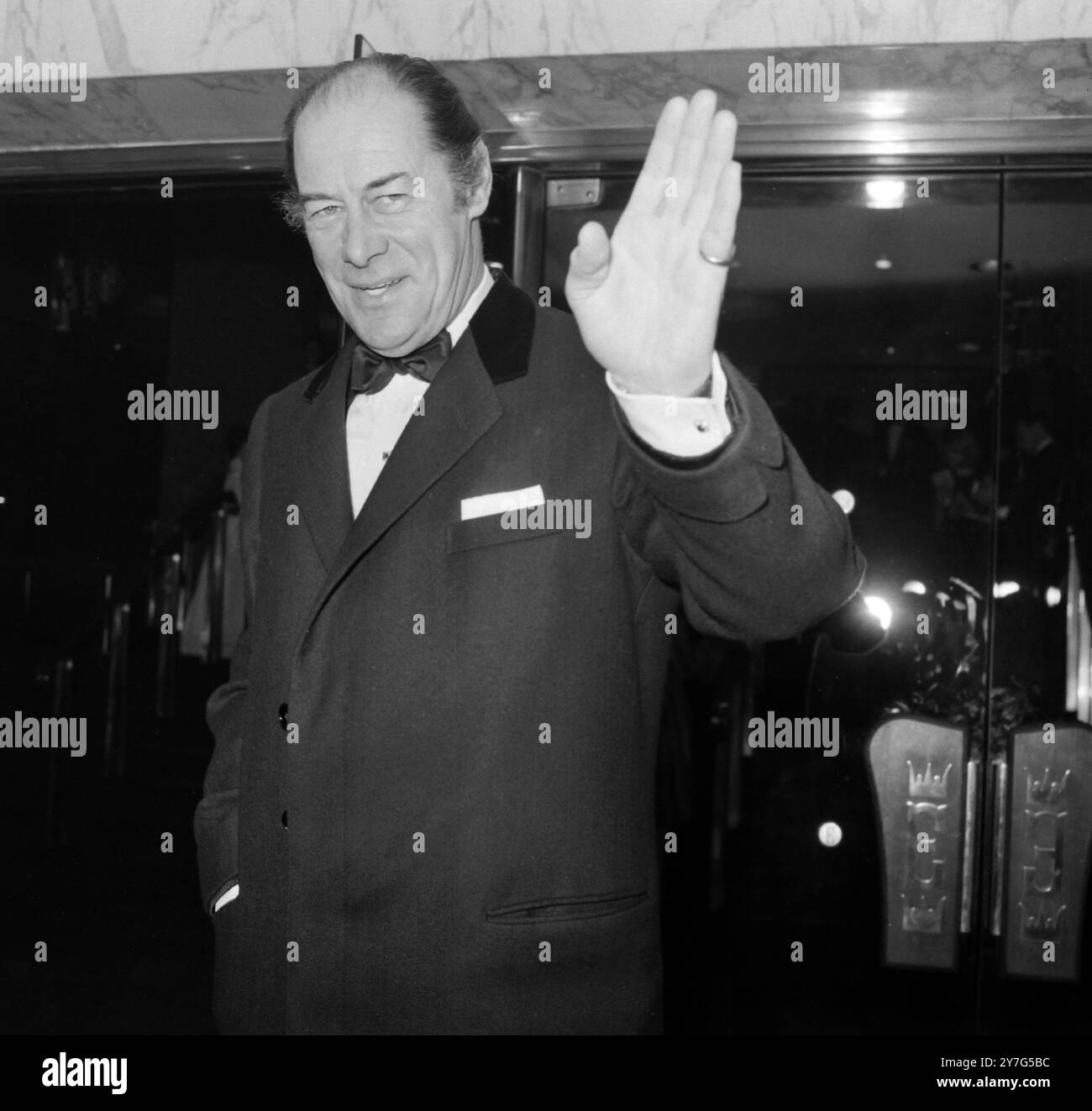 30 DECEMBER 1964 Rex Harrison pictured on arrival at the Gala world ...