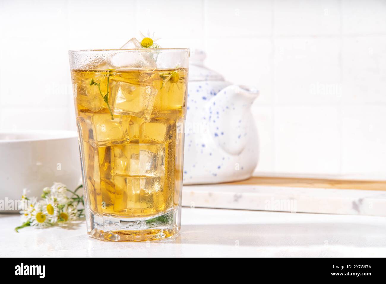 Herbal flower daisy chamomile ice tea, infused aromatic cold drink with ...